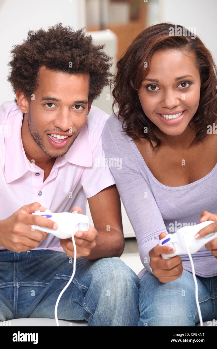 Couple playing computer games Stock Photo - Alamy