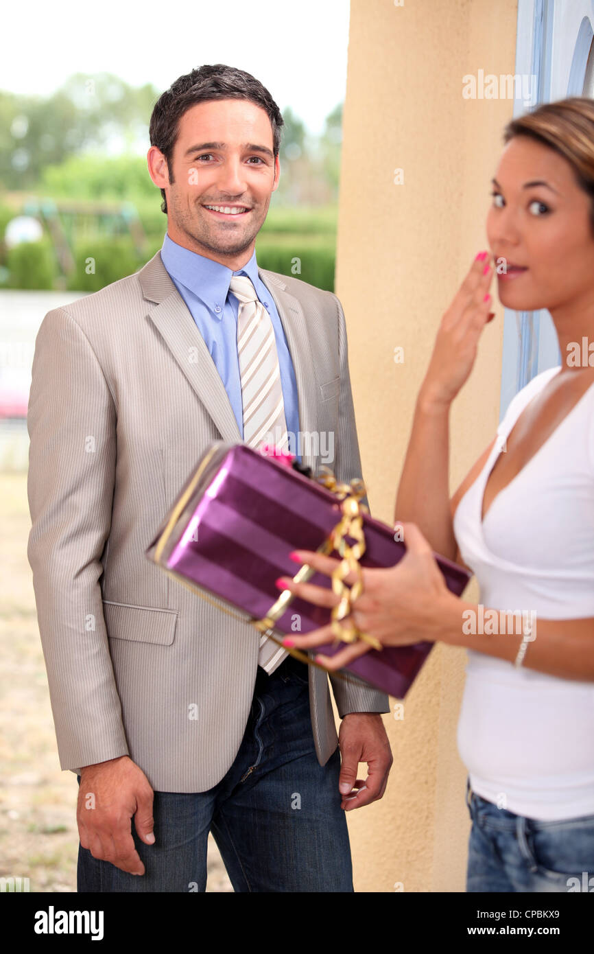 Woman receiving gift Stock Photo - Alamy