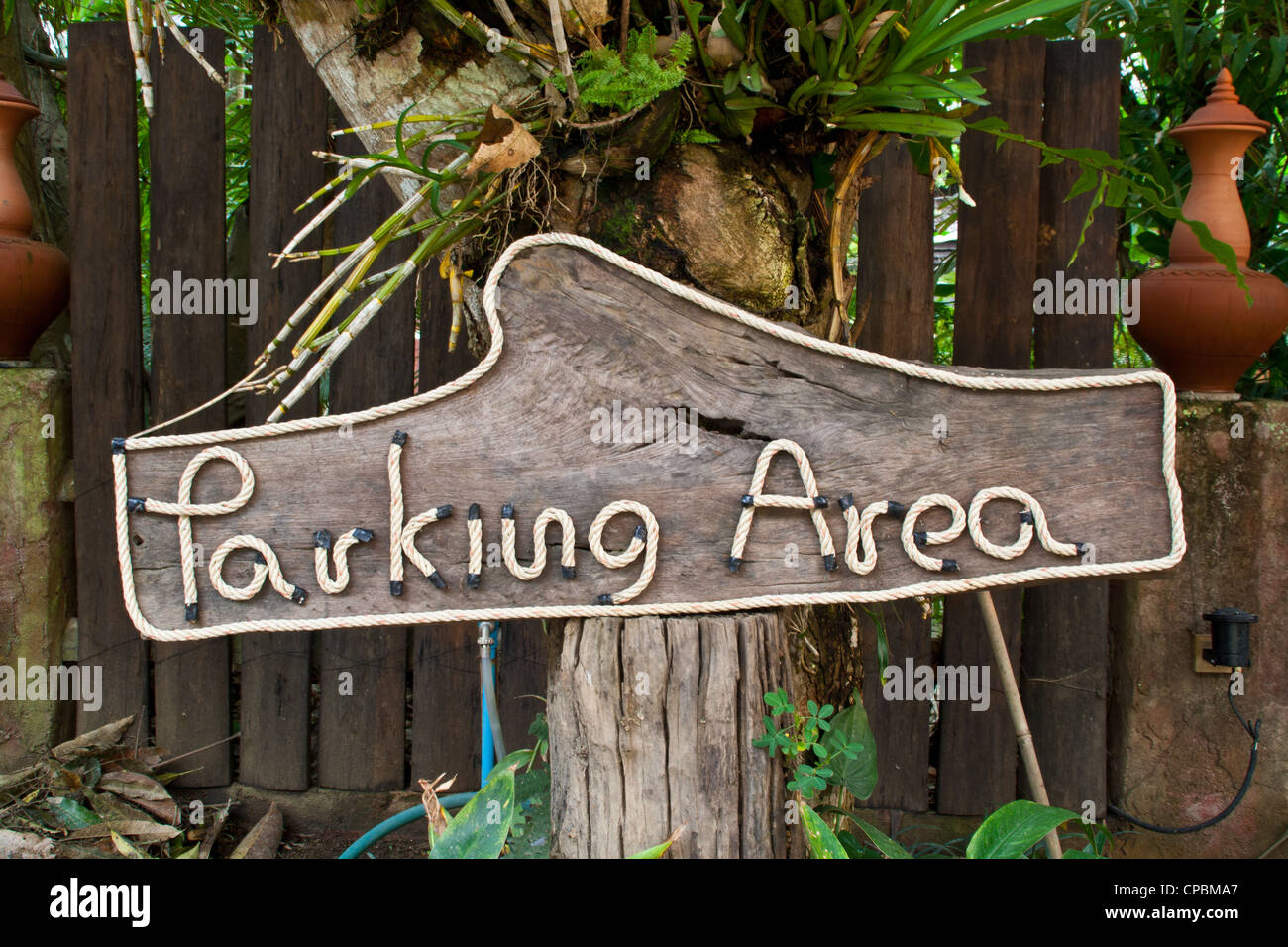 Parking signs are made from a wood-frame rope Stock Photo - Alamy