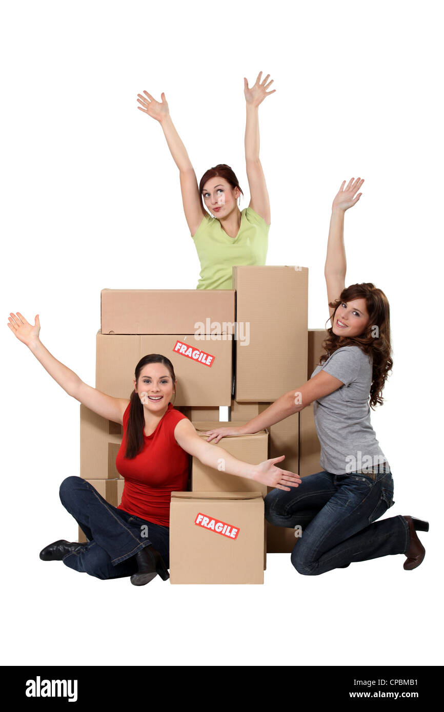 Three roommates moving out Stock Photo - Alamy