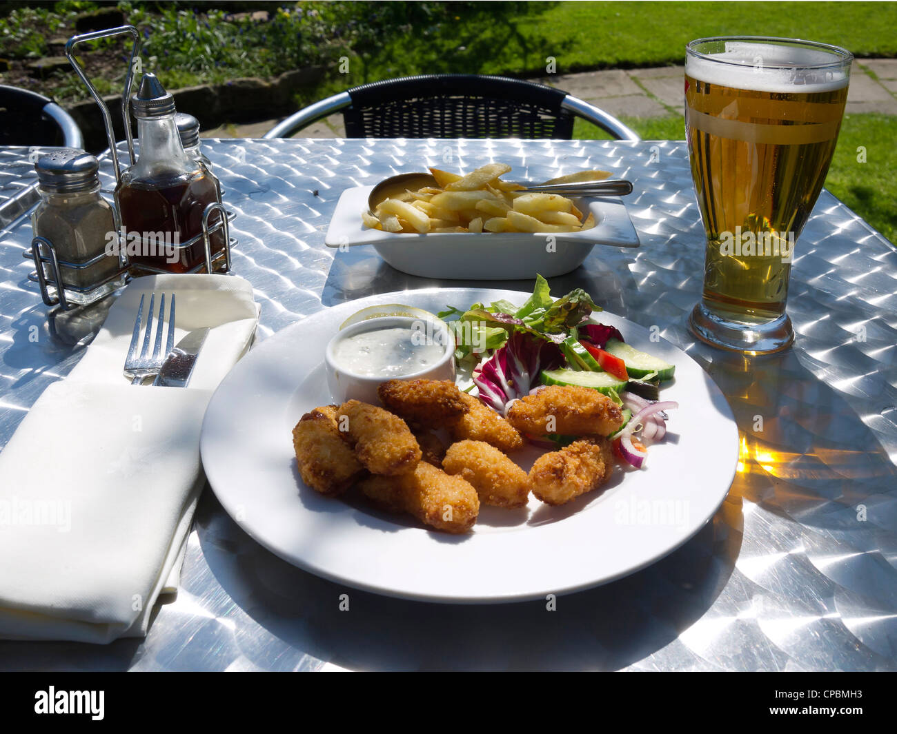 Lunch in a pub garden Scampi chips salad and a pint of Lager spring ...