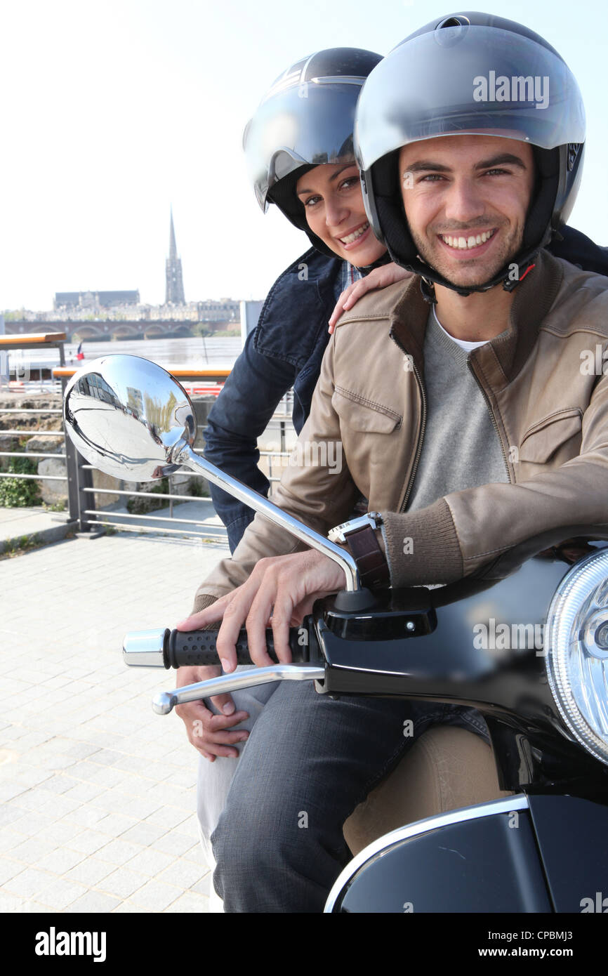 Motorcycle riders couple young riding hi-res stock photography and ...