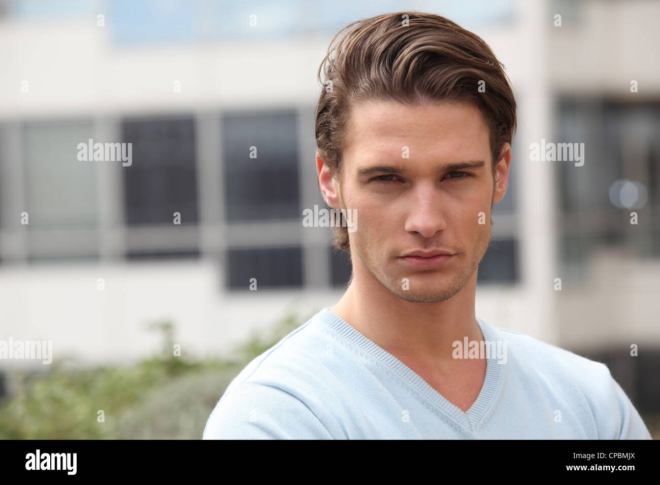 Attractive man stood outside building hi-res stock photography and ...