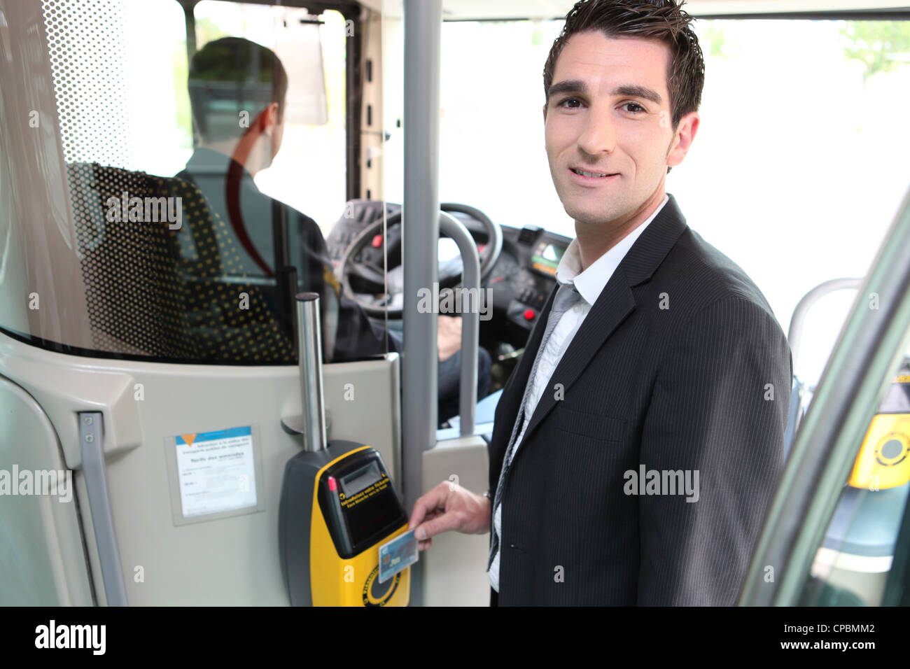 A young controller in a bus Stock Photo - Alamy