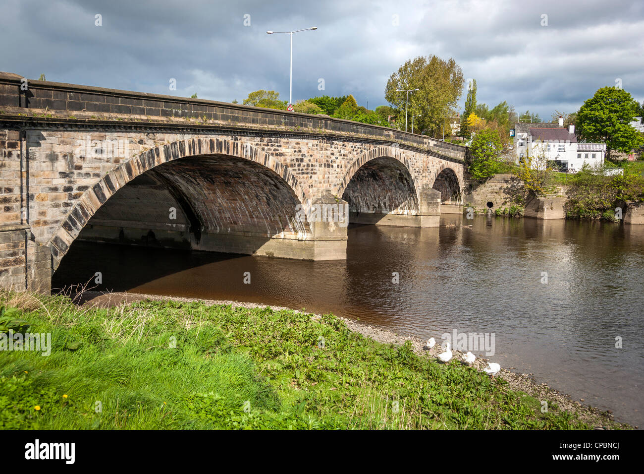 Walton Bridge carrying the A6 over the river Ribble at the border of ...