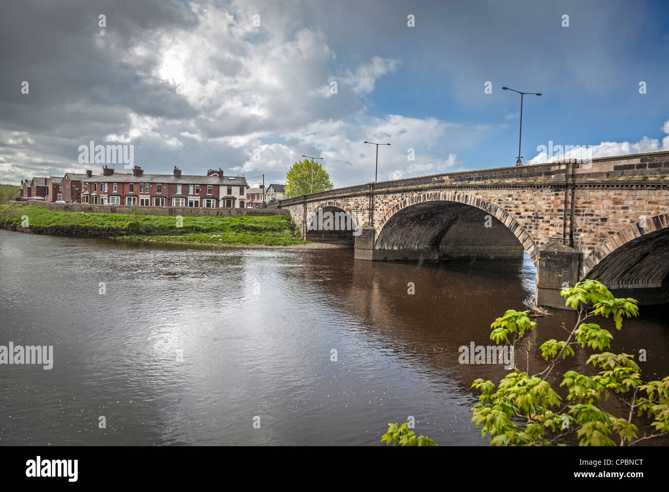 Walton Bridge carrying the A6 over the river Ribble at the border of ...