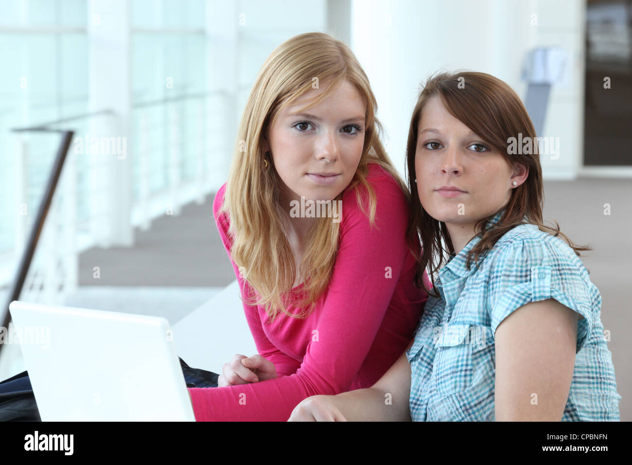 female duo in office Stock Photo - Alamy