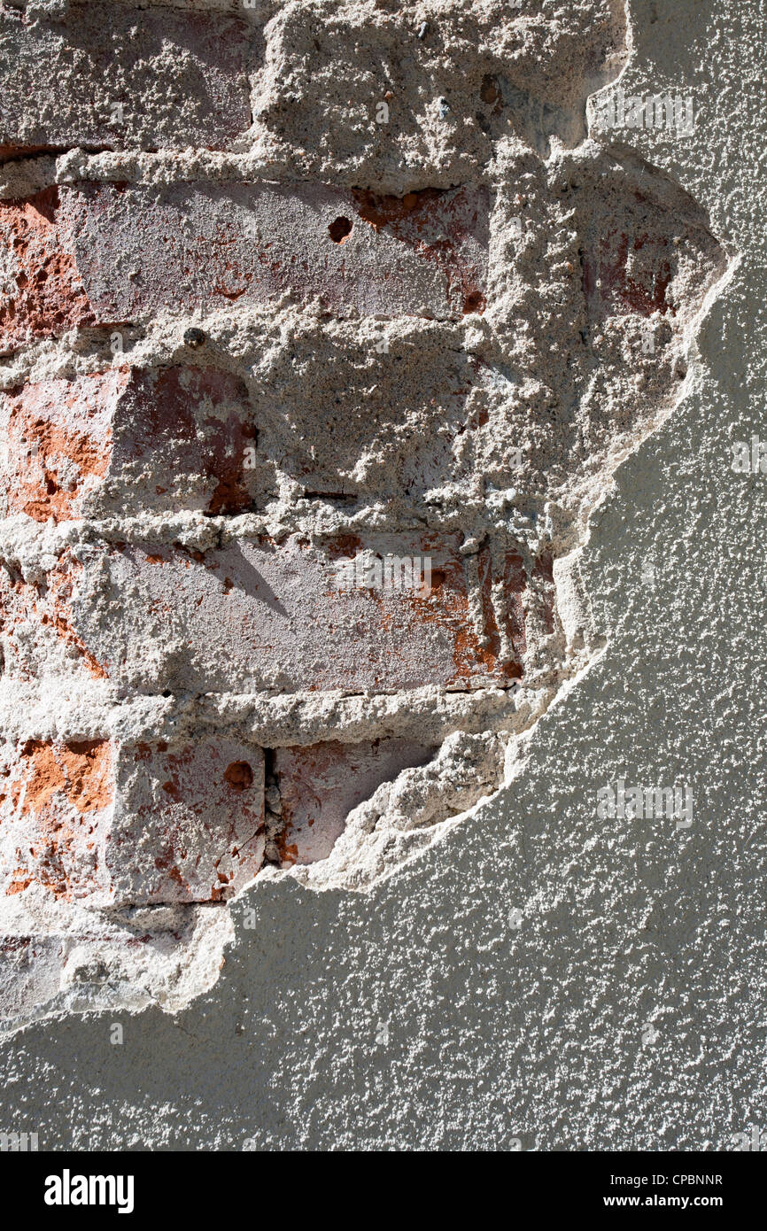 damaged plaster on building corner Stock Photo - Alamy