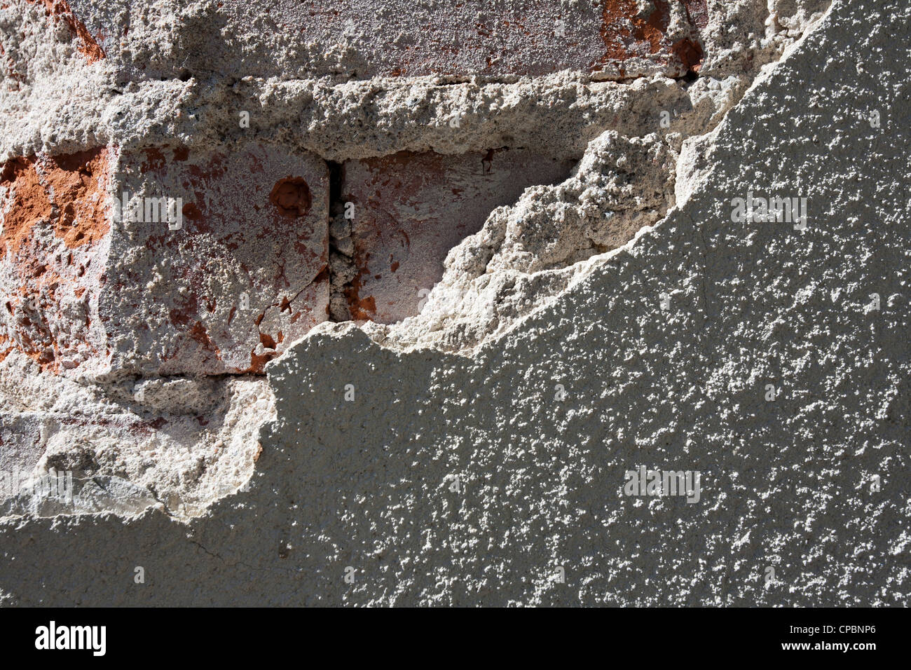 damaged plaster on building corner Stock Photo - Alamy