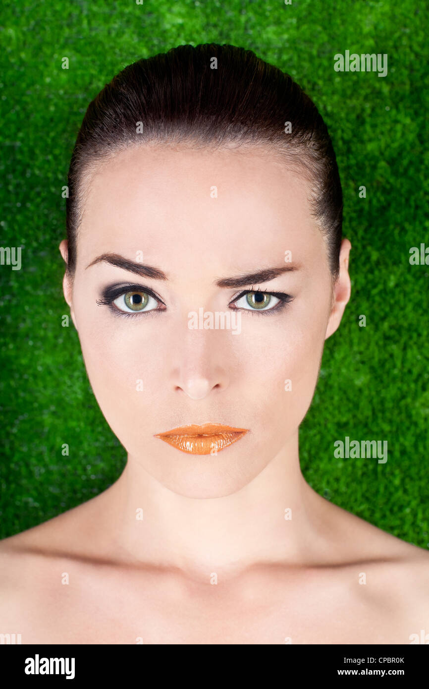 Woman raising eyebrow hi-res stock photography and images - Alamy
