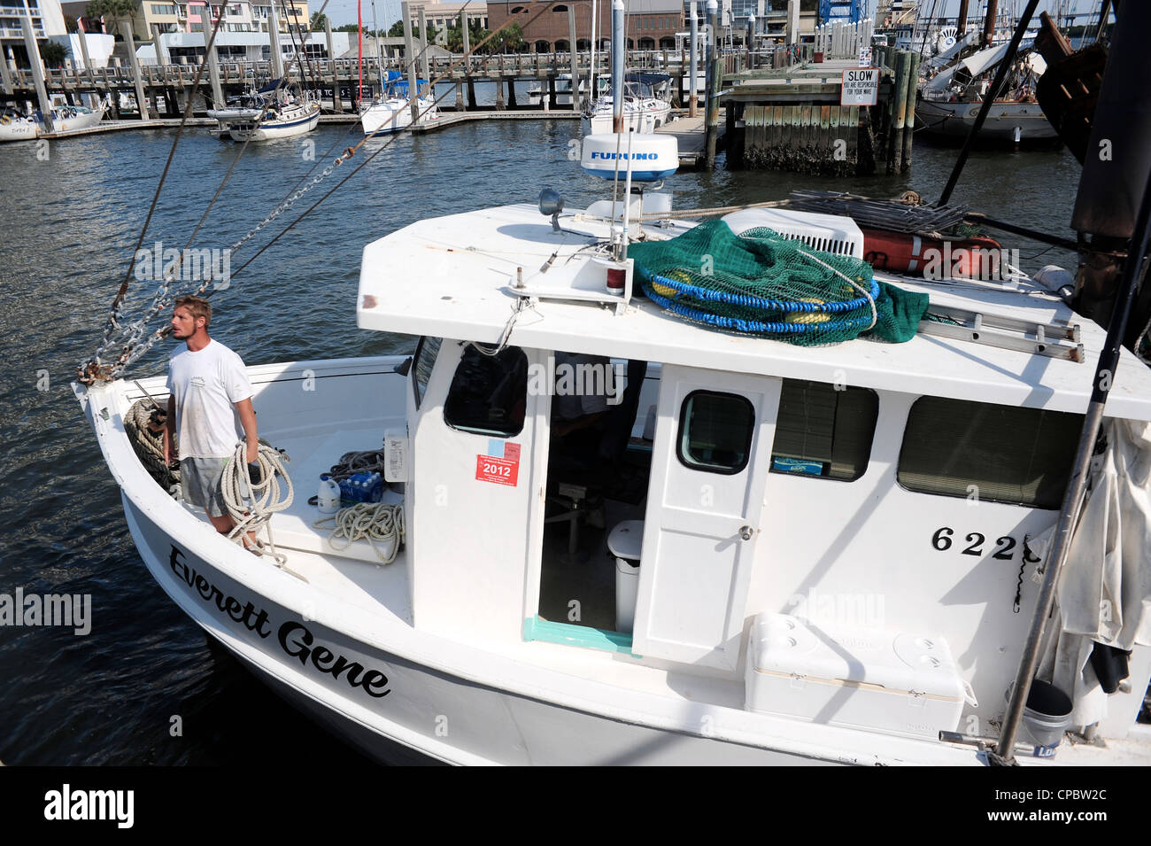 Trawler ready to dock Stock Photo - Alamy