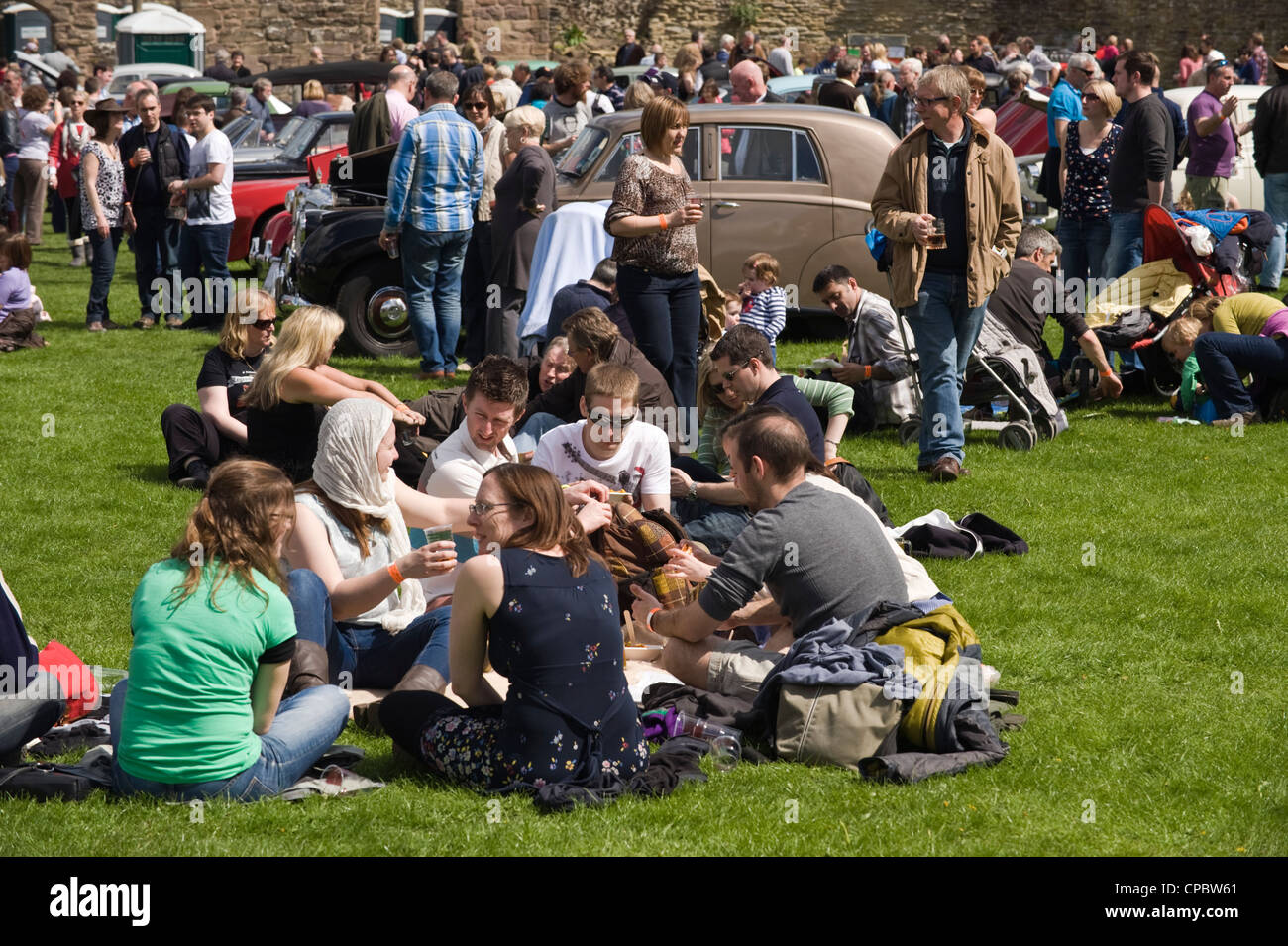Crowds relax and enjoy the sunshine at the Marches Transport Festival ...