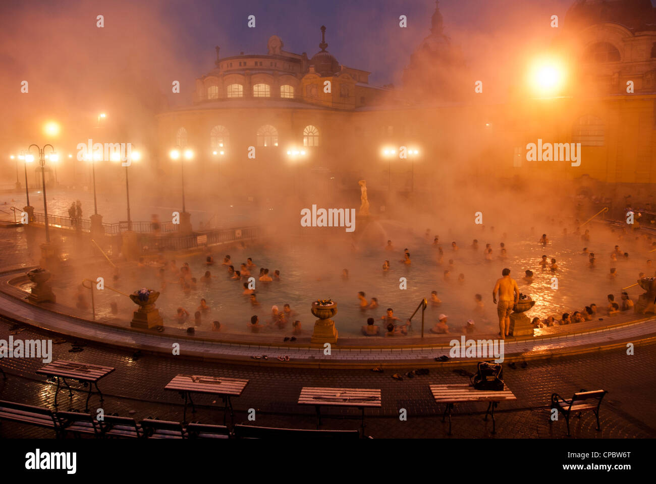 People enjoying the natural thermal waters at famous Szechenyi Baths ...