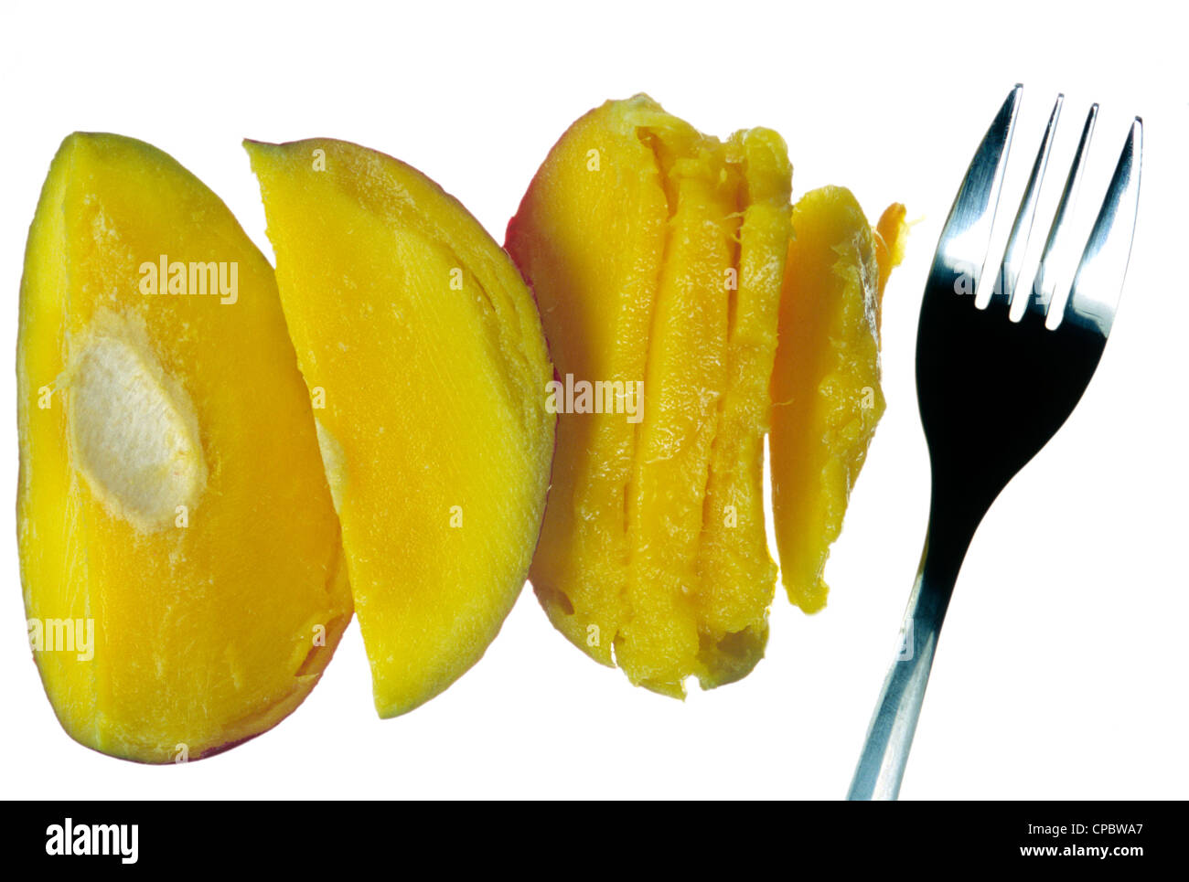 Mango Fruit White Background and Fork Stock Photo - Alamy