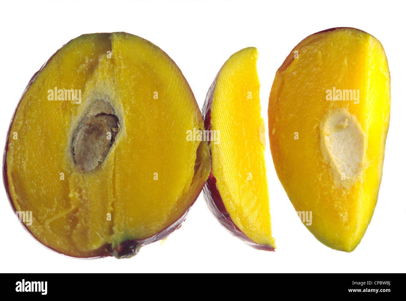 Half Mango Fruit White Background Stock Photo - Alamy