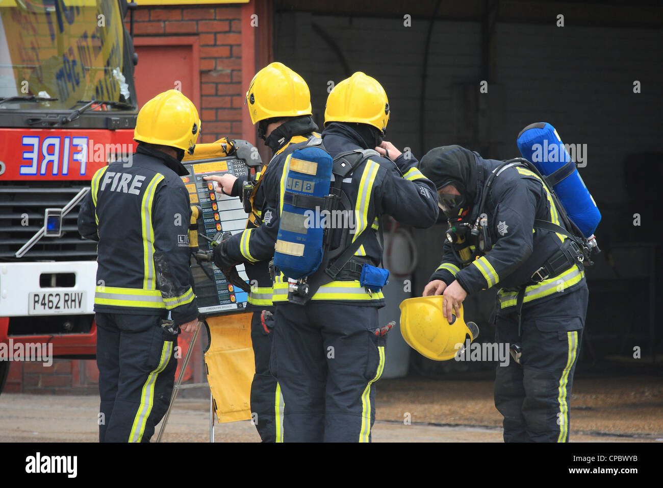 London Fire Brigade Firefighters at BA Control point during a fire in ...