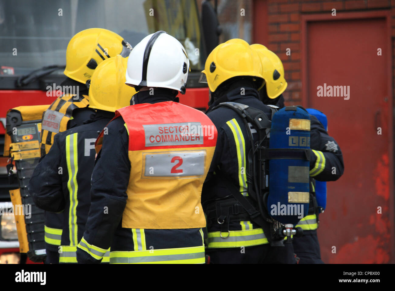 London Fire Brigade Firefighters at BA Control point during a fire in ...
