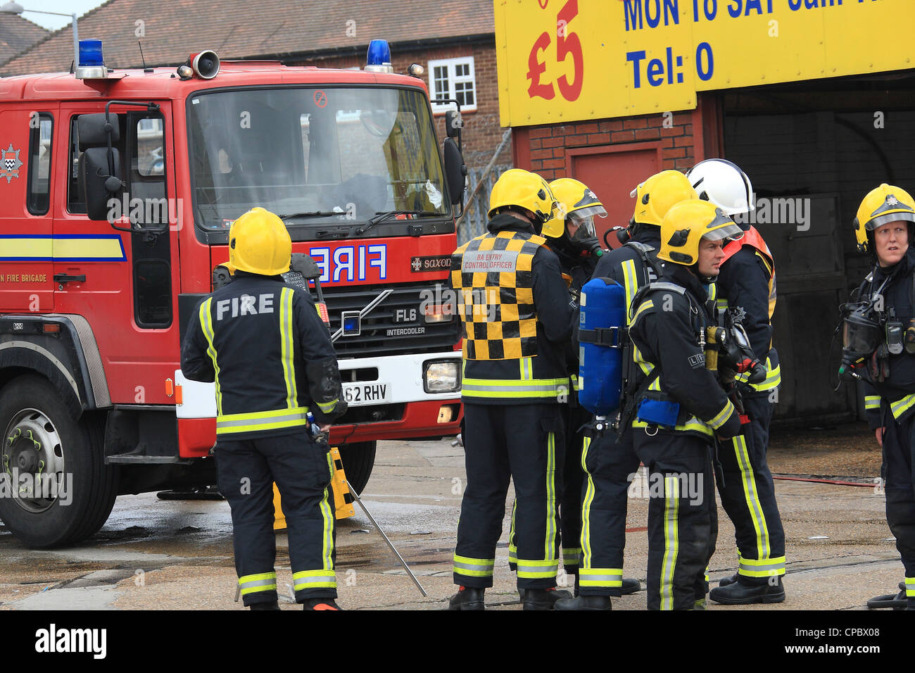 London Fire Brigade Firefighters at BA Control point during a fire in ...