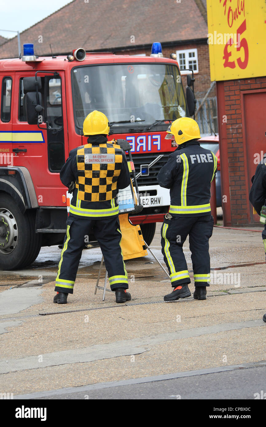London Fire Brigade Firefighters at BA Control point during a fire in ...