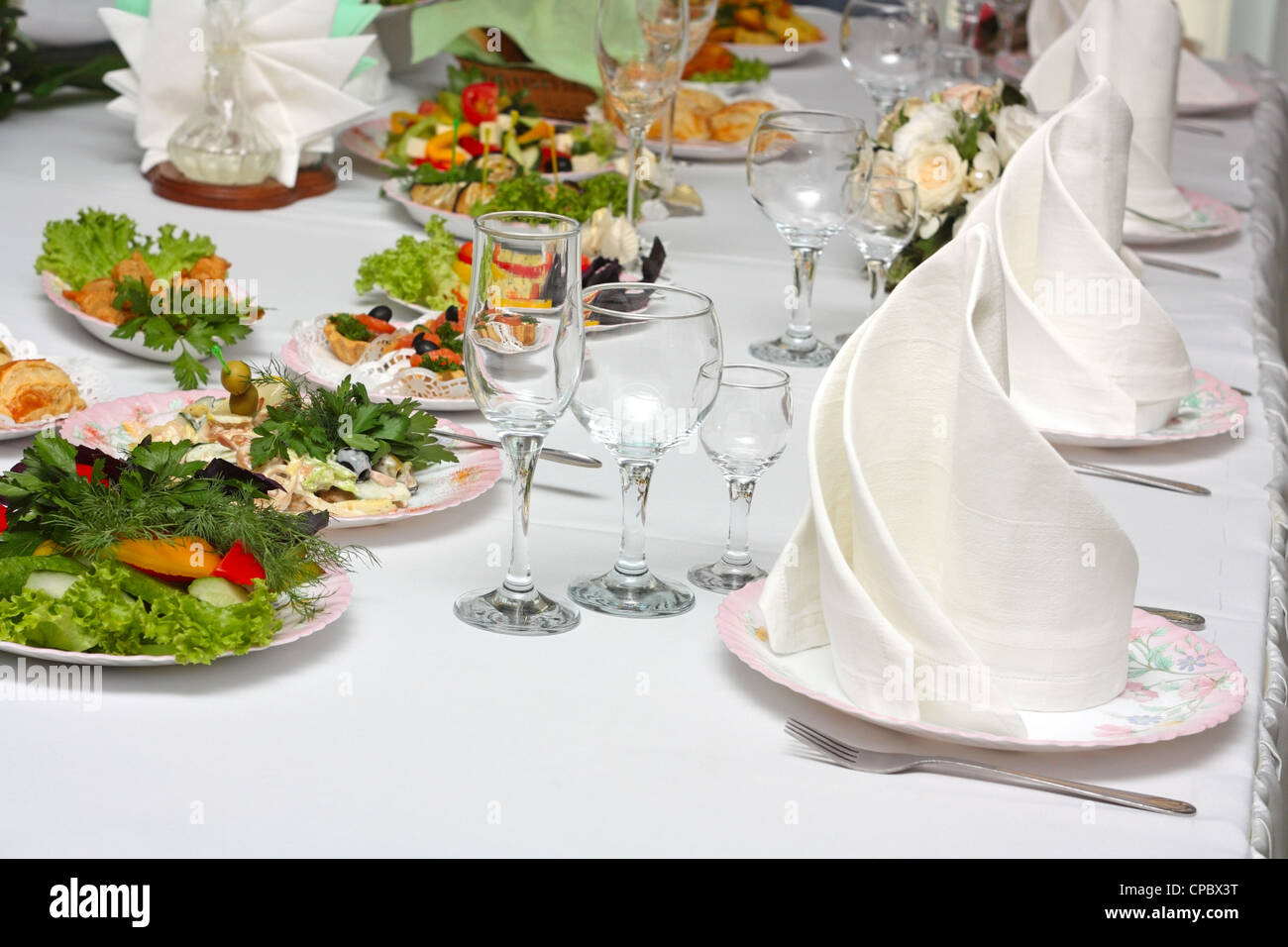 Table setting, dining table with snacks Stock Photo - Alamy