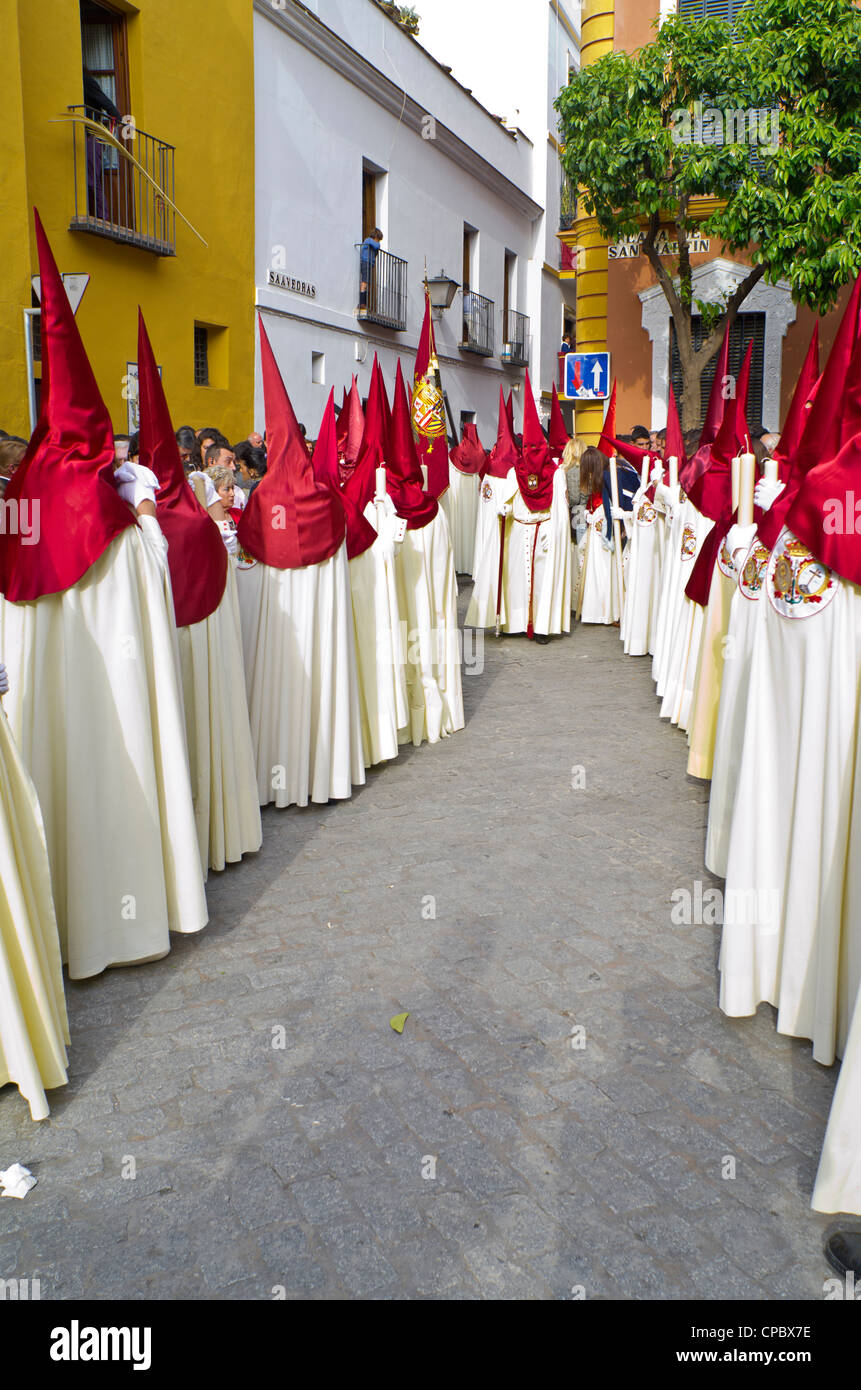 Penitents of La Lanzada brotherhood procession during Holy Week in ...