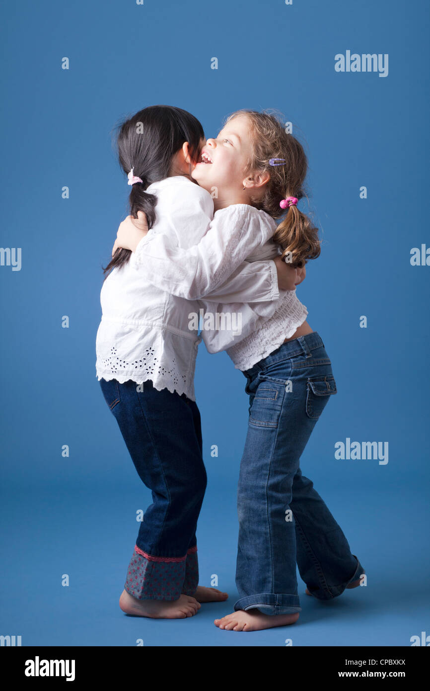 Two Little Girls Hugging