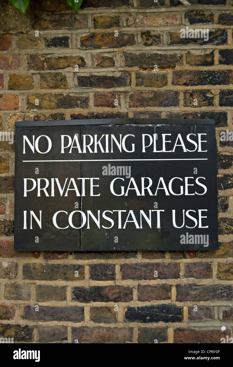 no parking please private garages in constant use sign in islington ...