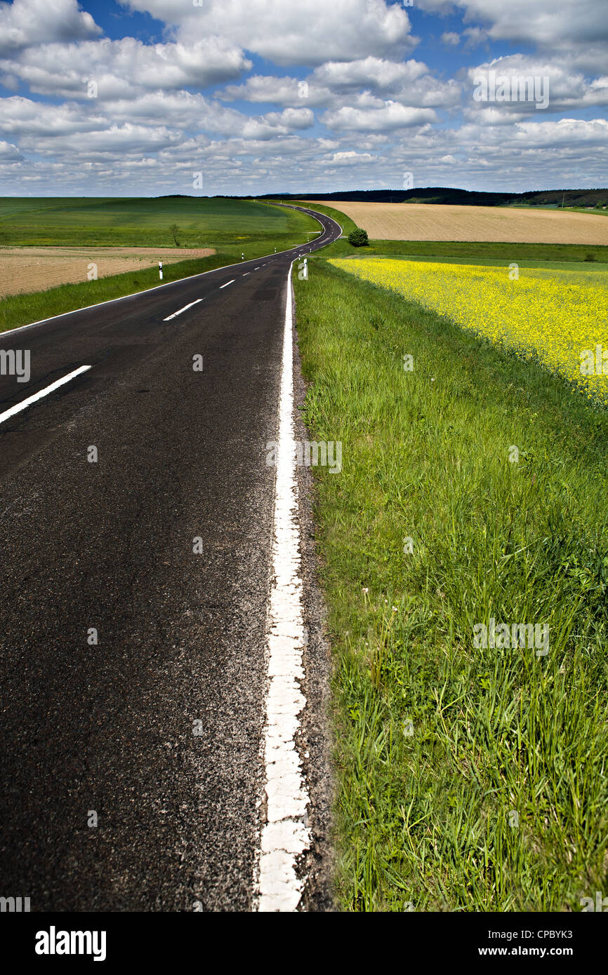a road in the rural lansdscape in Germany Stock Photo - Alamy