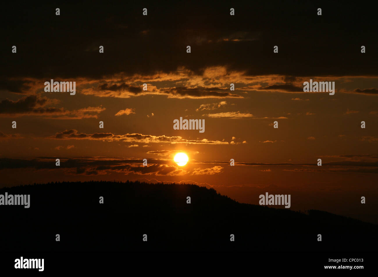 Deep golden sunset over hills in Jonschwil, Switzerland Stock Photo - Alamy