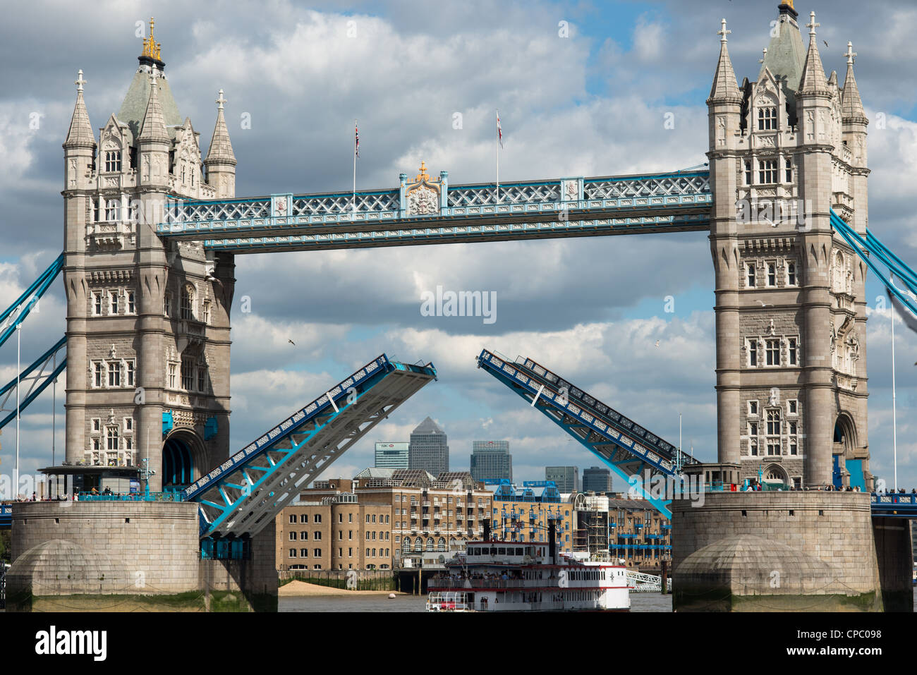 Tower Bridge opening to let ship pass through. London. UK Stock Photo ...