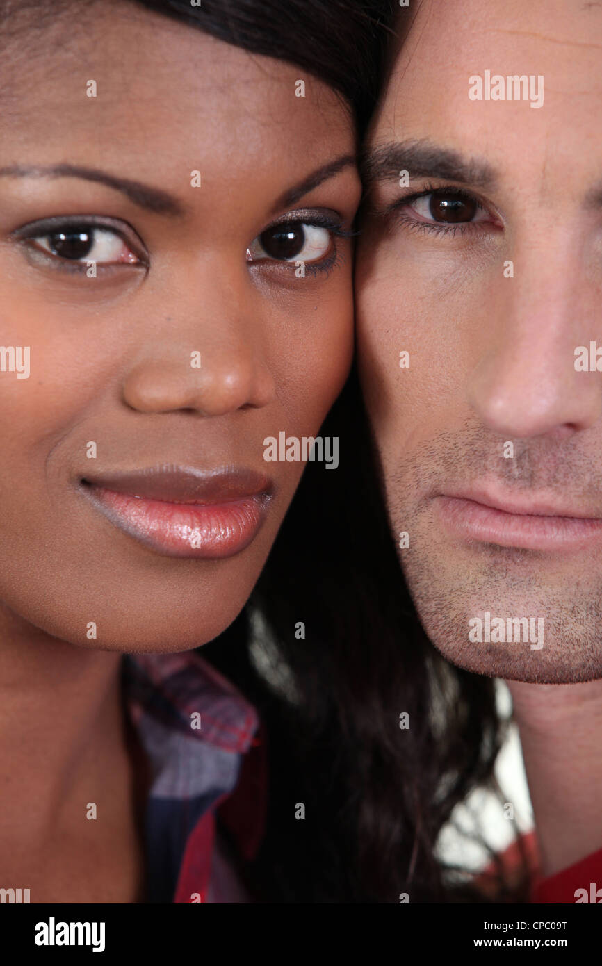 Couple stood with faces together Stock Photo - Alamy