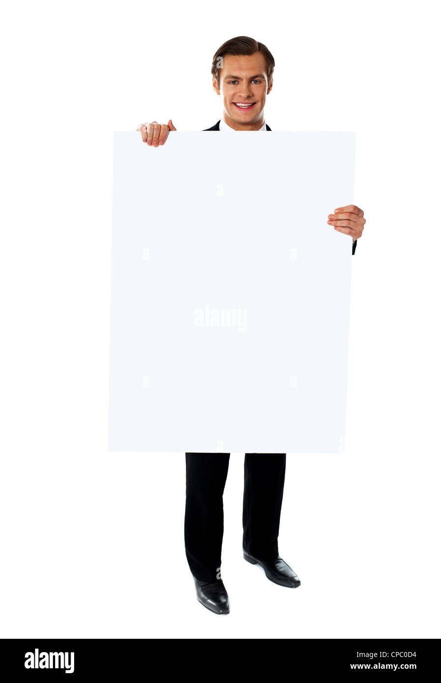 Young business executive promoting big blank banner ad isolated on ...