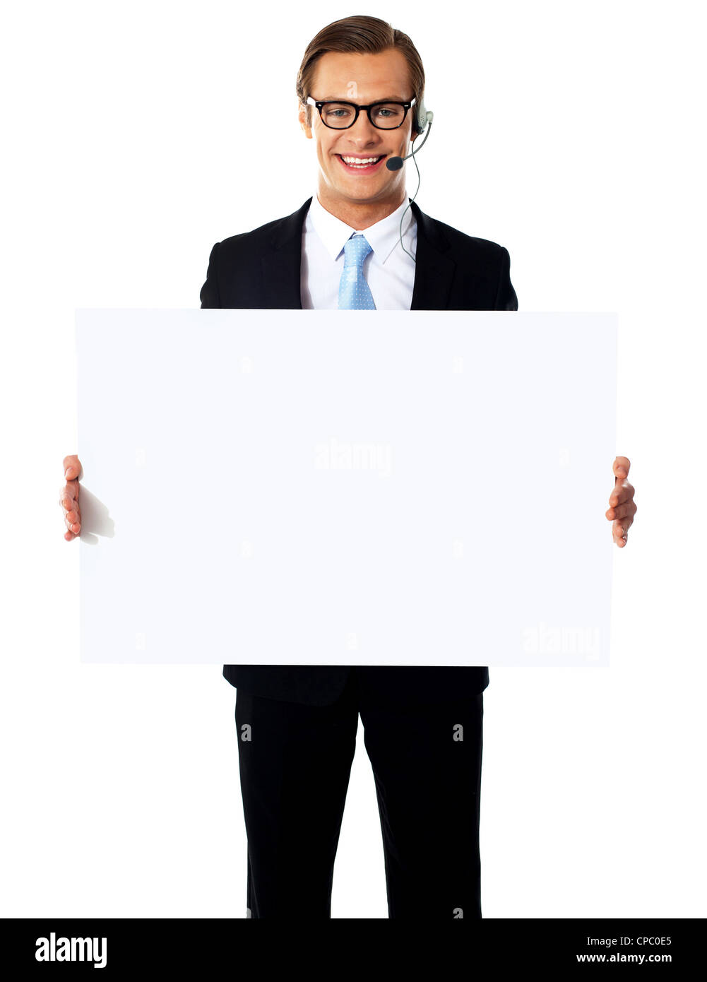 Smiling customer service male operator holding blank white billboard ...