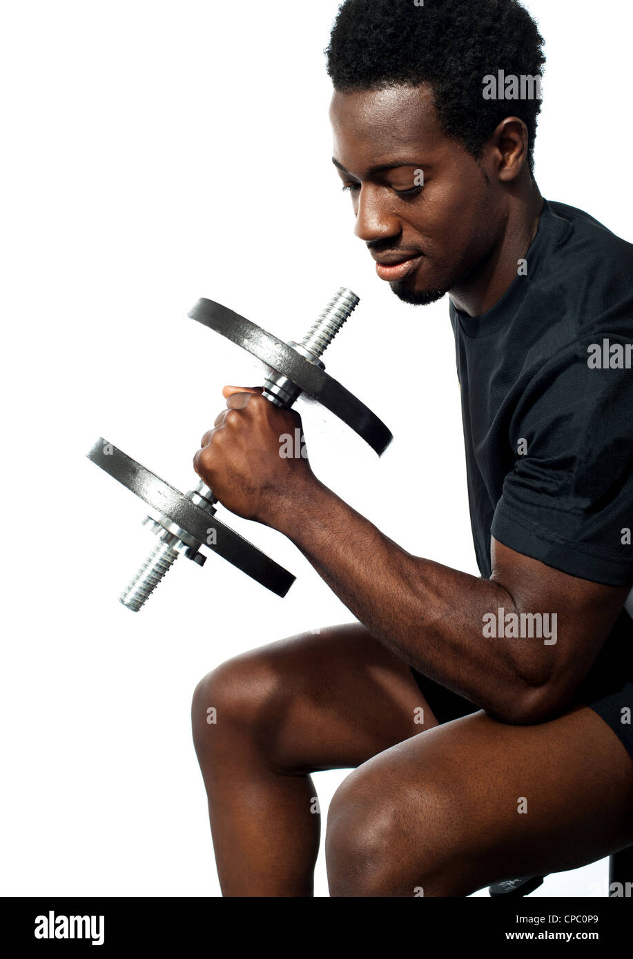 Portrait of happy fit african man working out with dumbbell Stock Photo ...