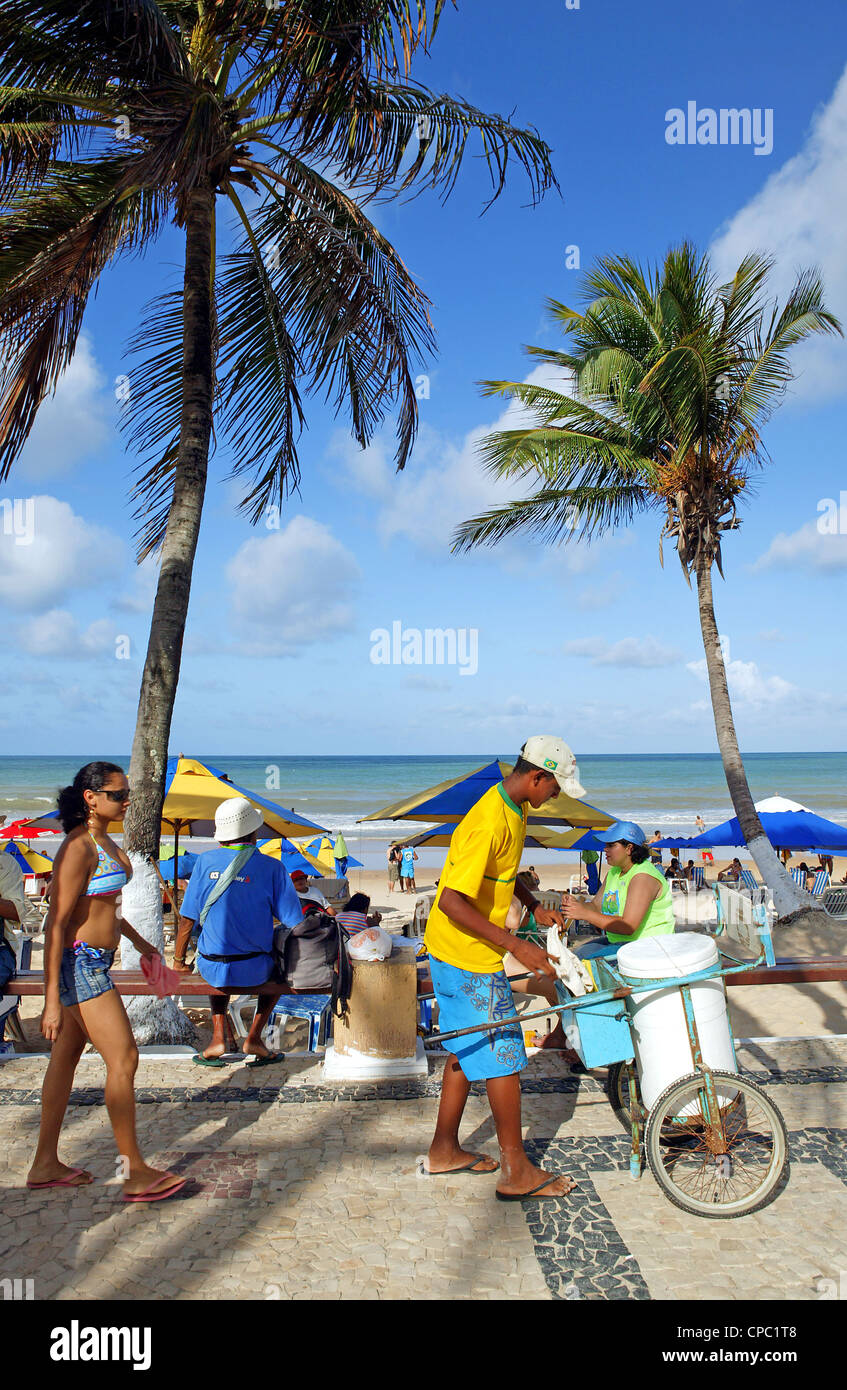 Brazil Natal people walking and selling ice cream and T-shirts in the ...