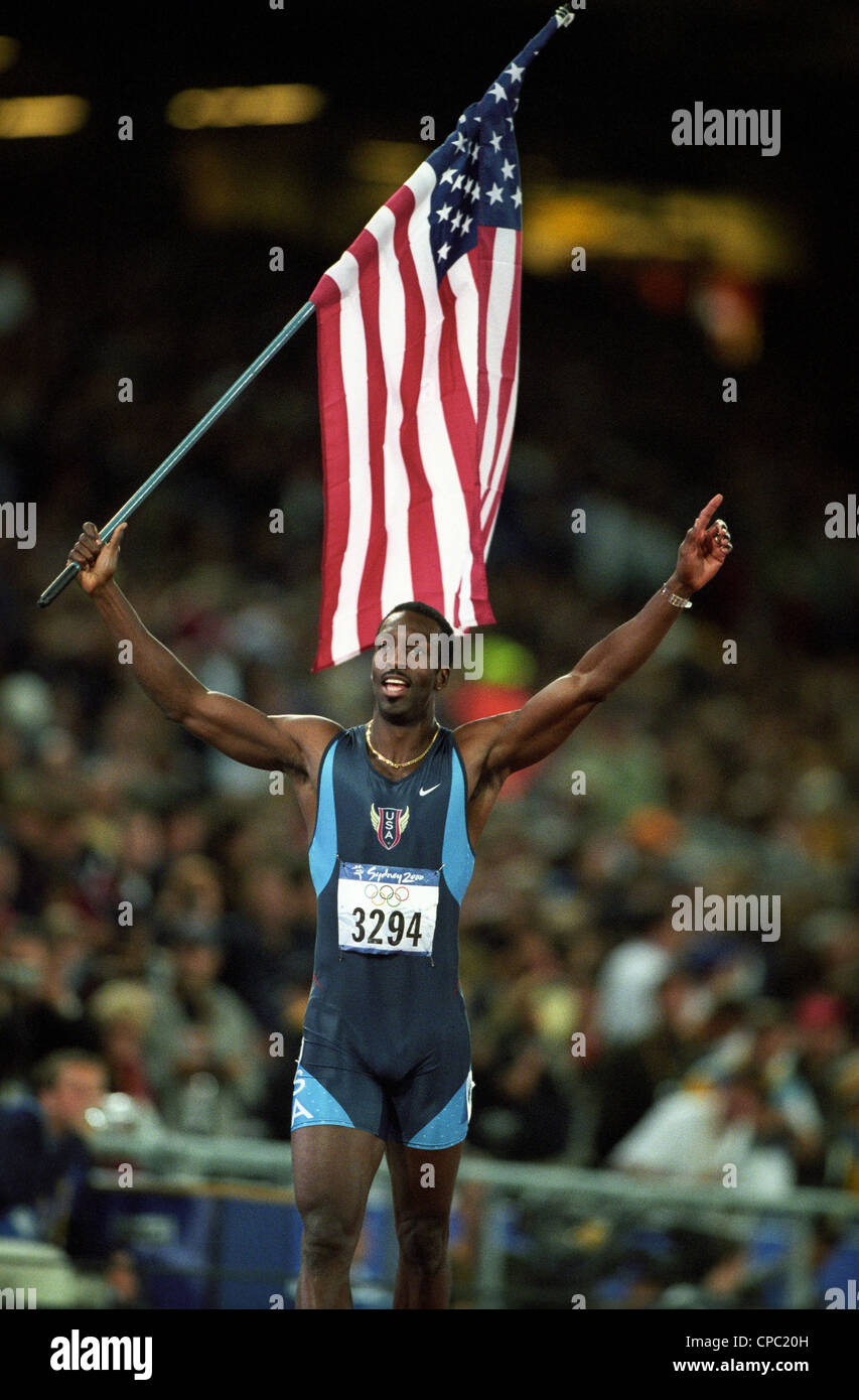 Michael Johnson after winning the gold medal in the 400m at the 2000 ...
