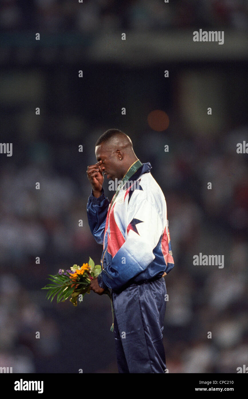 Michael Johnson on the podium after receiving his gold medal for the ...