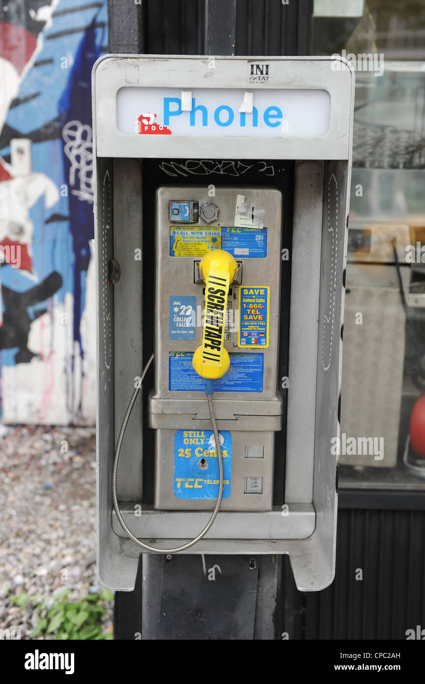 Yellow telephone box hi-res stock photography and images - Alamy