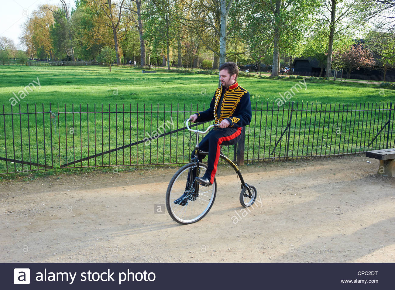 Man Riding A Penny Farthing Bicycle Stock Photos & Man Riding A Penny ...