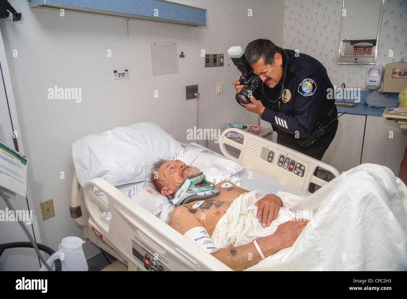 At a local hospital a Hispanic police crime scene investigator ...