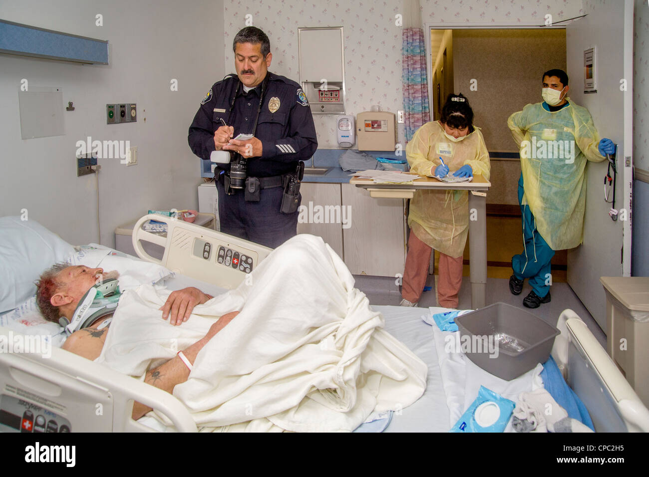At a local hospital a Hispanic police crime scene investigator ...