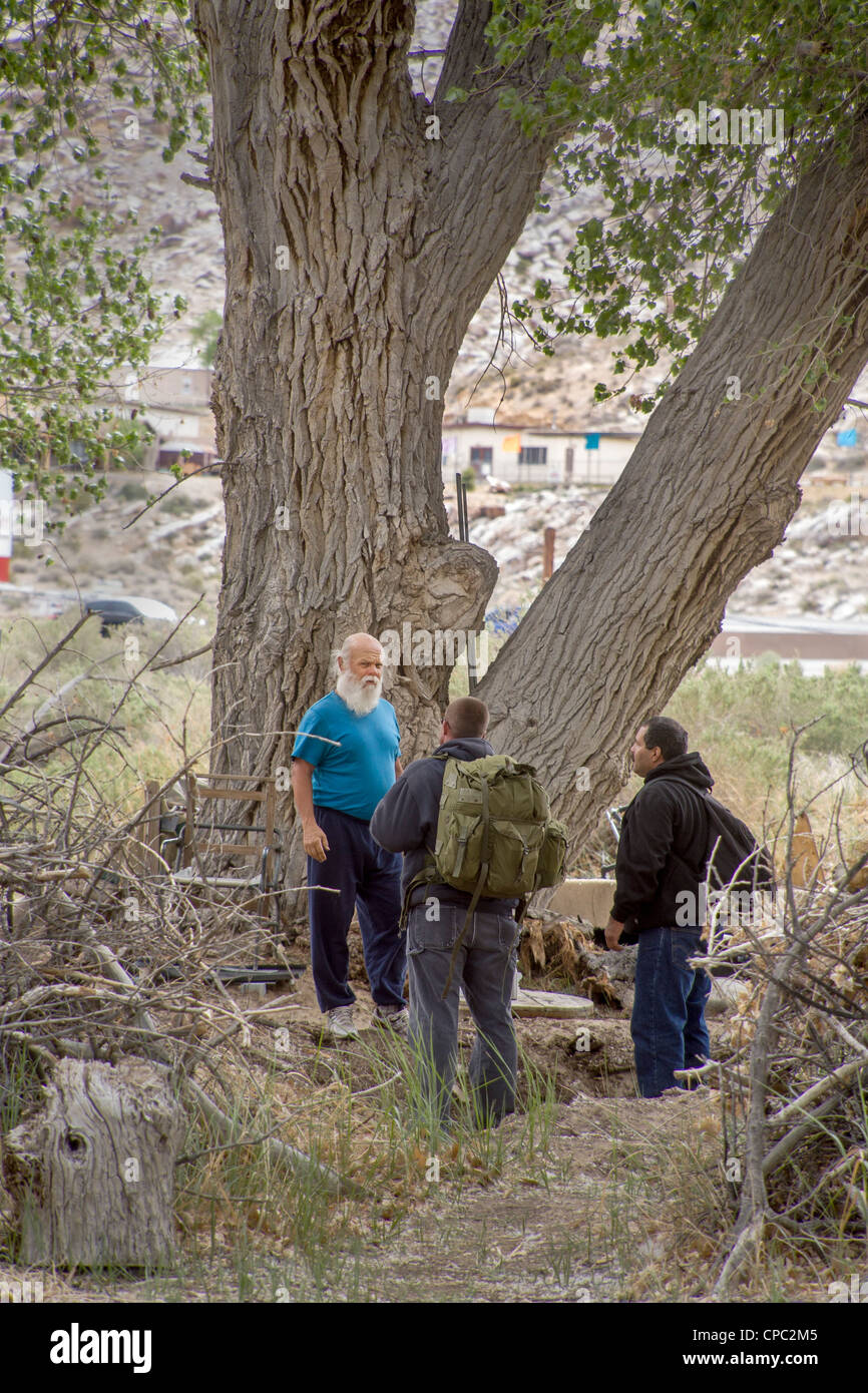 An old man meets a social worker an outdoor homeless encampment in the ...