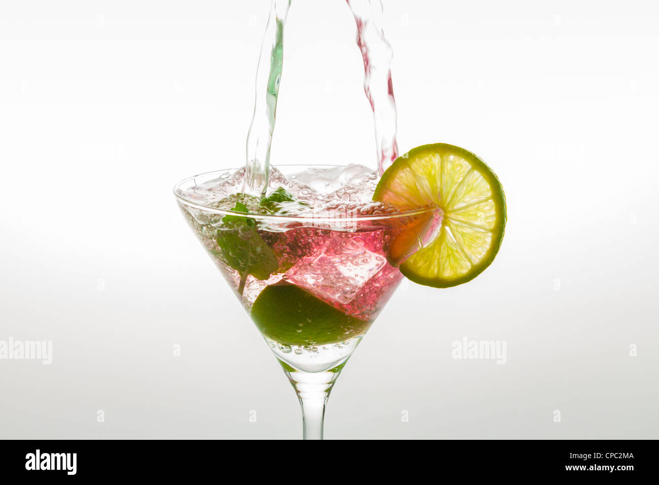 Cocktail drink being finished Stock Photo - Alamy