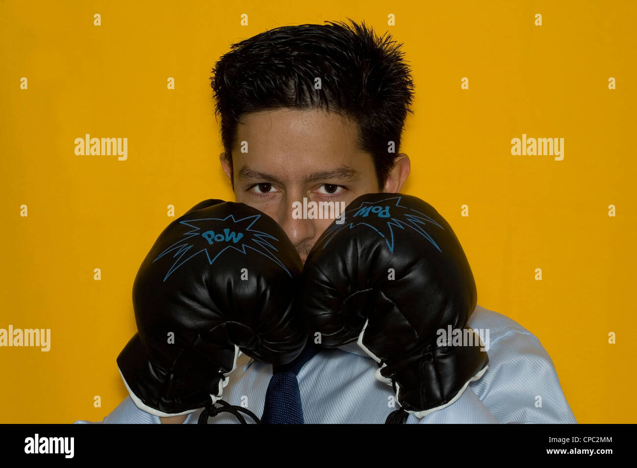 aggressive businessman ready to punch everyone Stock Photo - Alamy