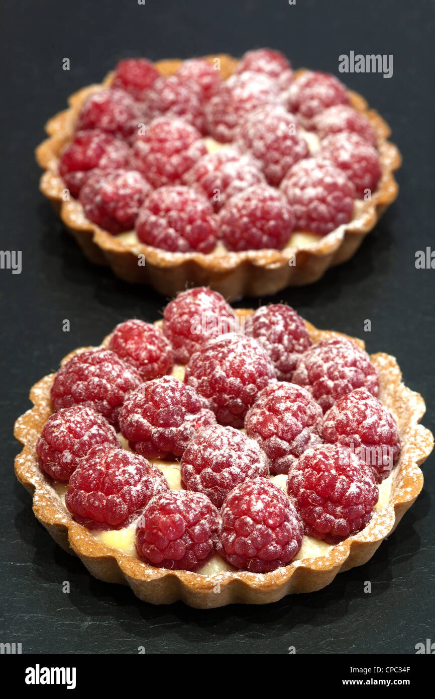 Lemon Tarts with Raspberries Stock Photo - Alamy