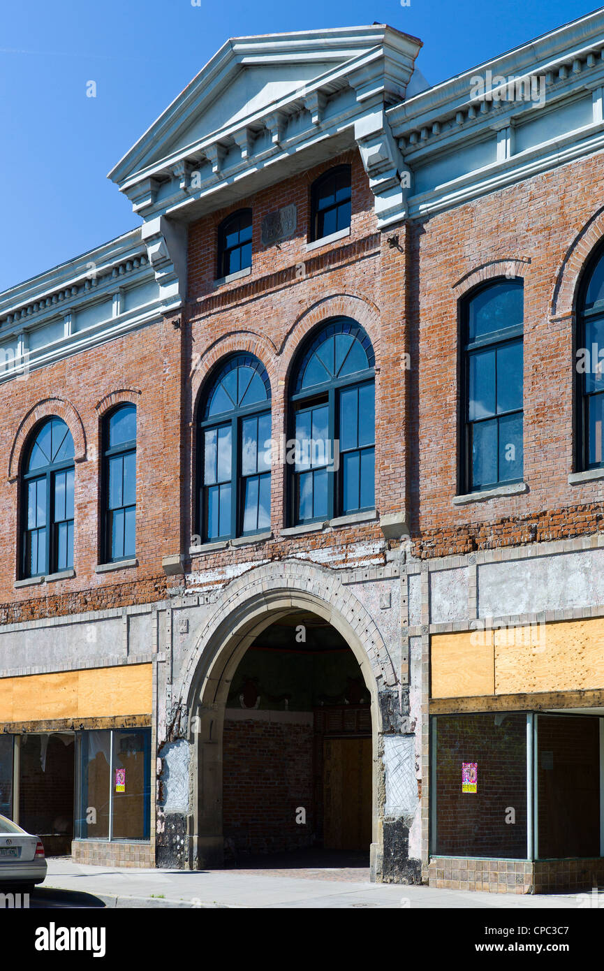 Front facade of the historic Unique Theater in partial decay, Salida ...