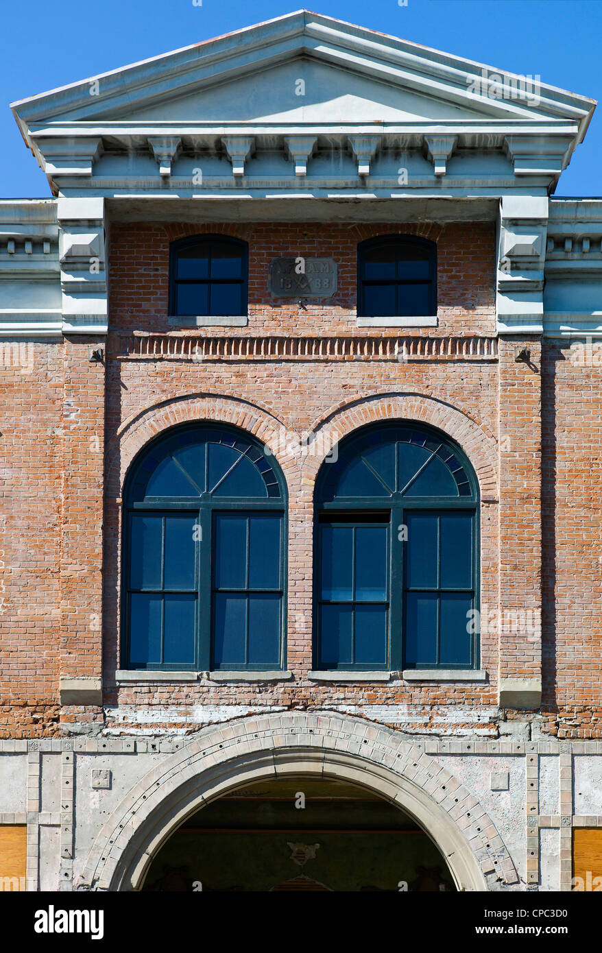 Front facade of the historic Unique Theater in partial decay, Salida ...