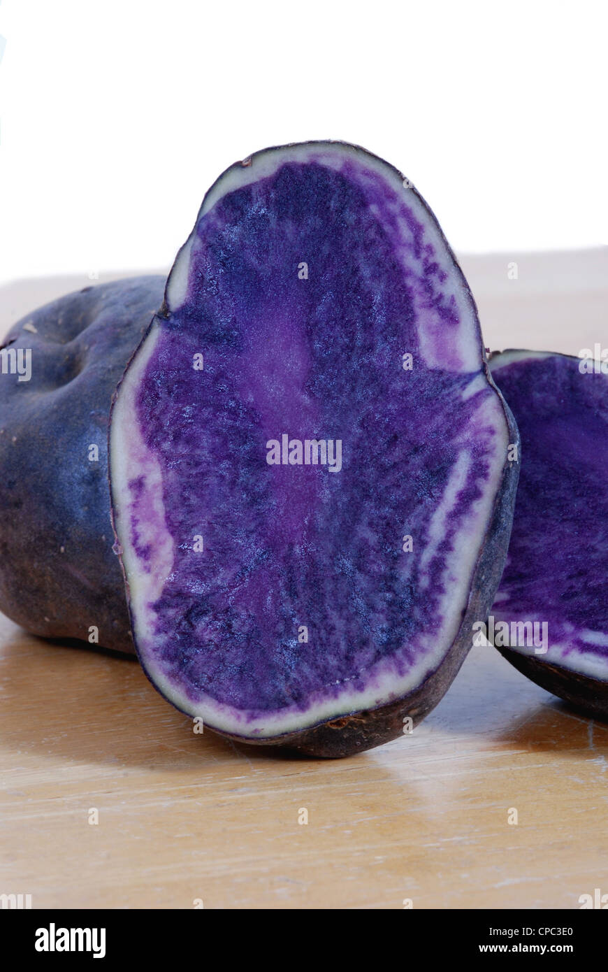Close up of blue potatoes, sliced in half Stock Photo - Alamy
