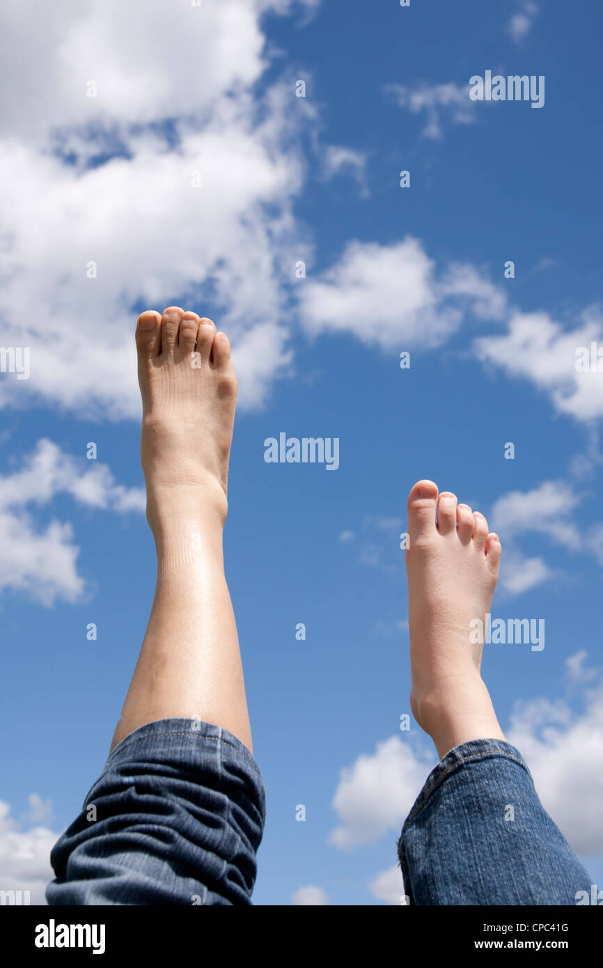 Putting their right foot forward or in this case, upward Stock Photo ...