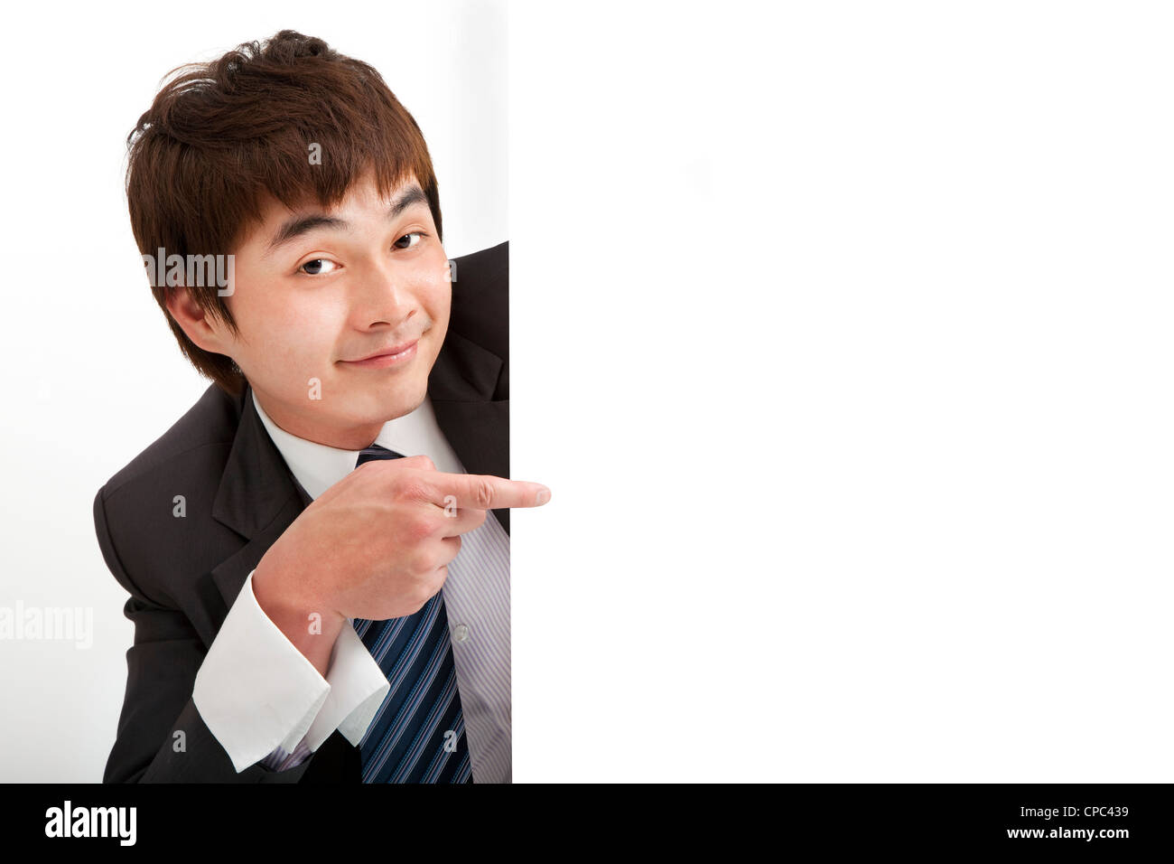 smiling businessman pointing blank board Stock Photo - Alamy smiling businessman pointing blank board Stock Photo - Alamy